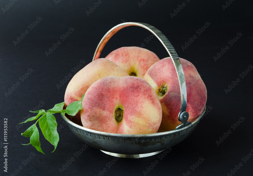 Saturn peaches or donut, UFO, flat peaches on black background Stock ...