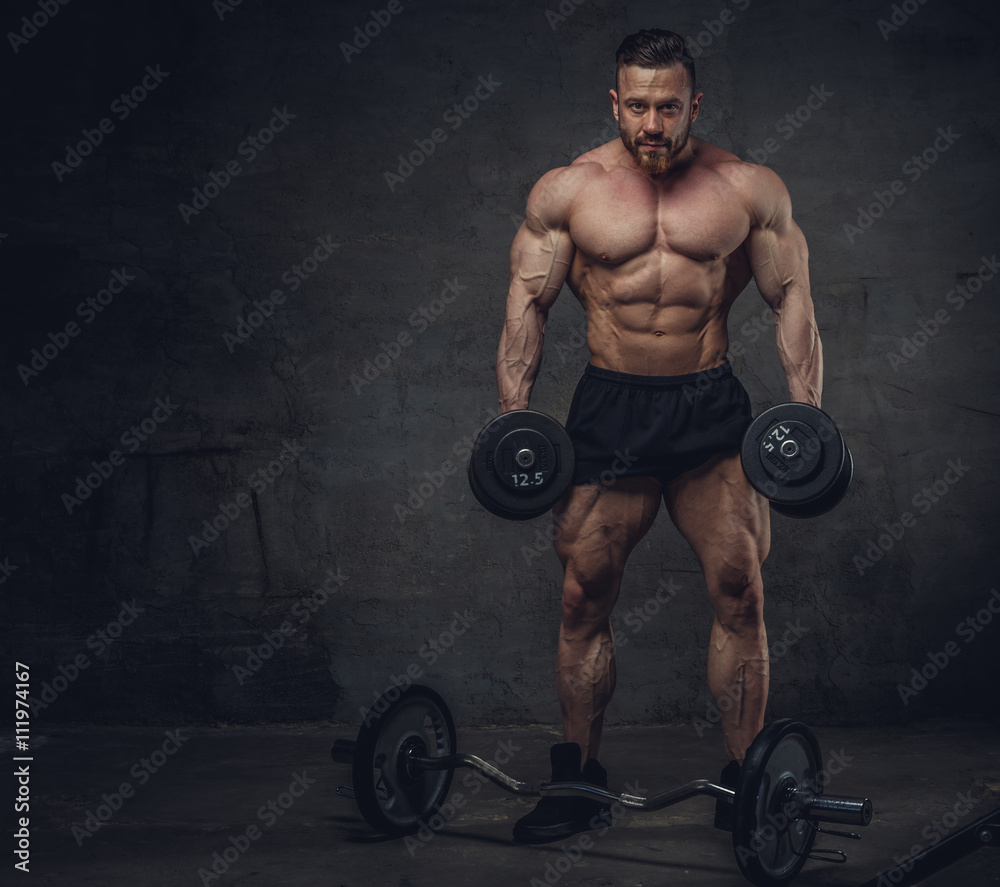 BPortrait of bodybuilder with dumbbells Stock Photo | Adobe Stock