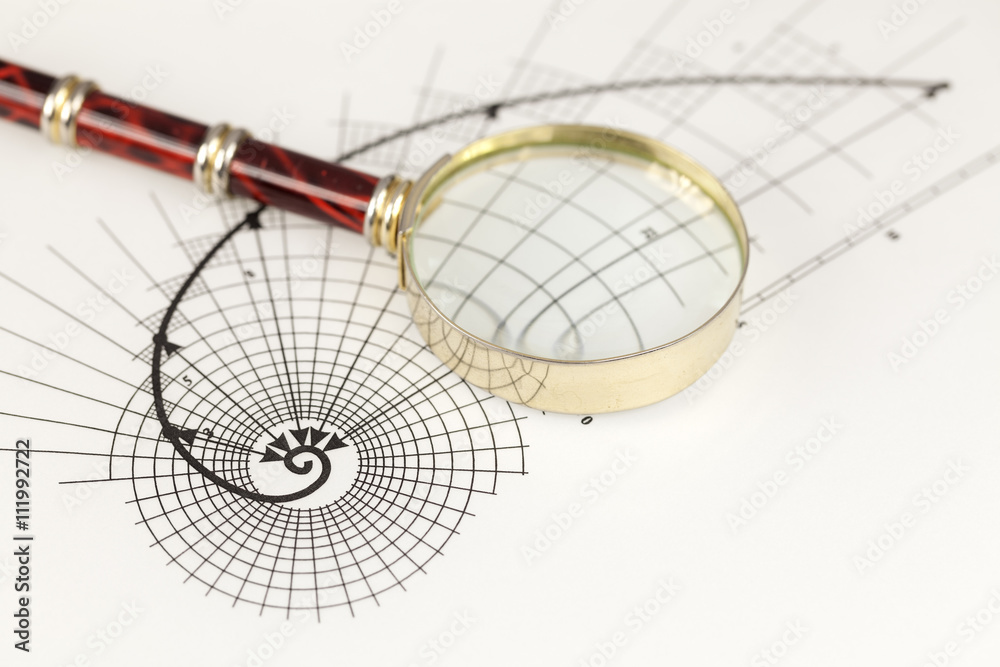 magnifying glass & drawing of the golden section Stock Photo | Adobe Stock