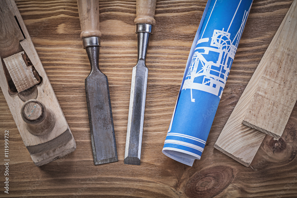 Blue rolled up construction drawing planer chisels wooden studs Stock ...