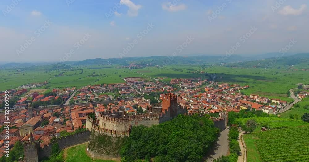 Soave (Italy) surrounded by vineyards that produce one of the most ...