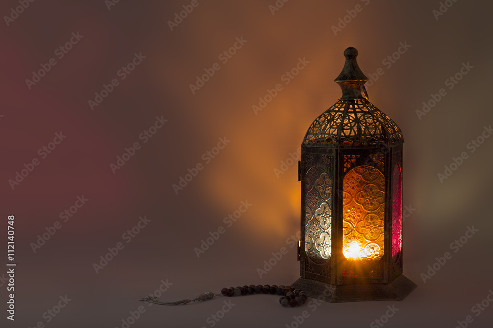 Lightened Lantern With Rosary Stock Photo | Adobe Stock