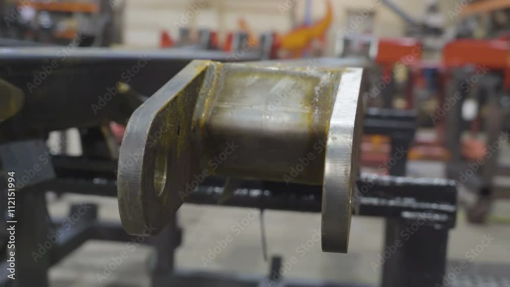 The edge of the metal bar in the room. This is to be used as a part of ...