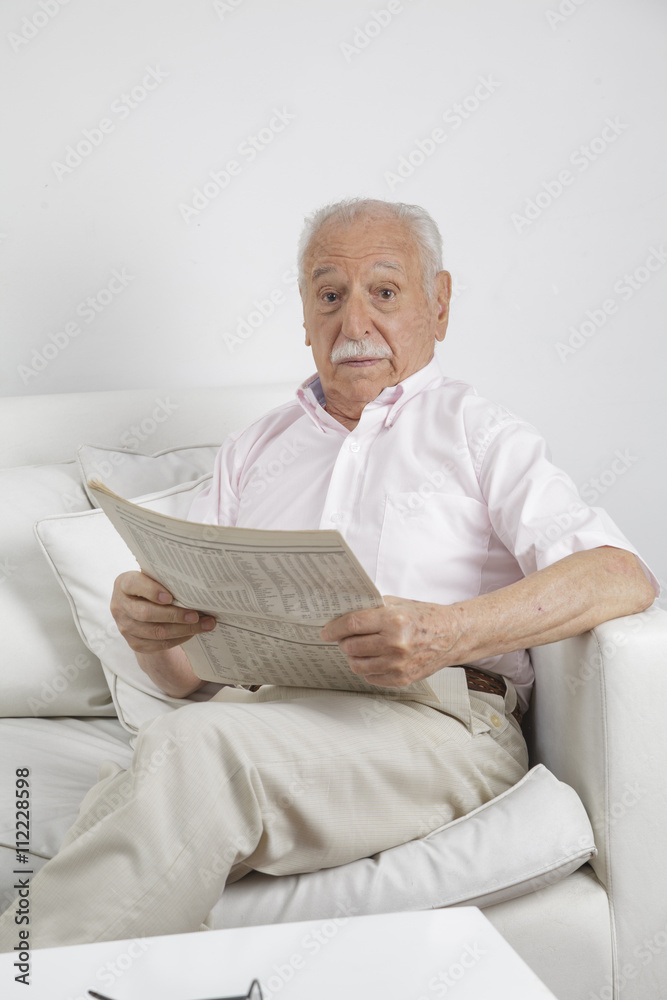 Man Reading The Newspaper