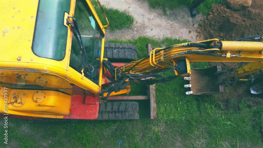 Excavator digging a trench for laying cables Stock ビデオ | Adobe Stock