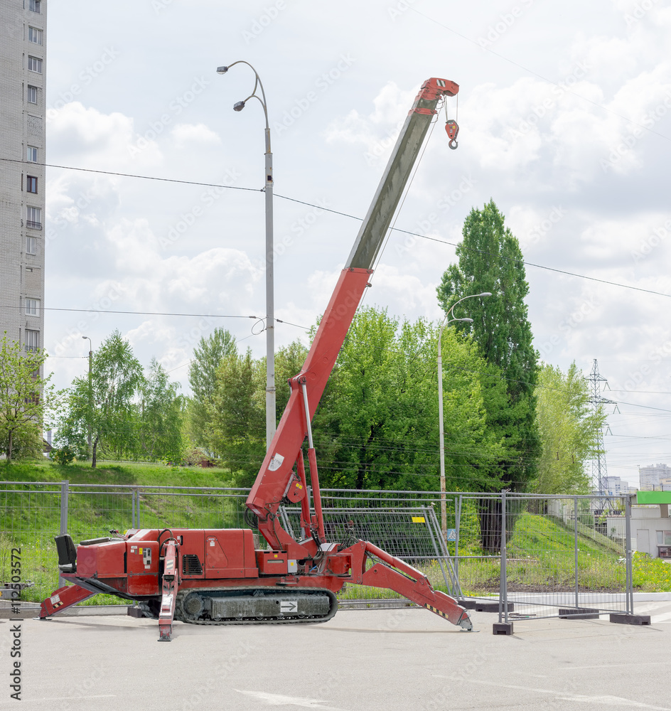 Self propelled crawler crane with telescoping boom on asphalt si Stock ...