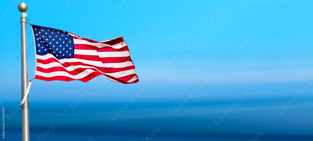 American flag waving in blue sky Stock Photo | Adobe Stock