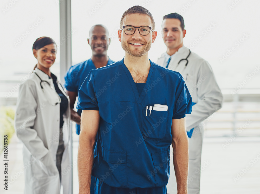 Relaxed confident doctor leading medical team Stock Photo | Adobe Stock