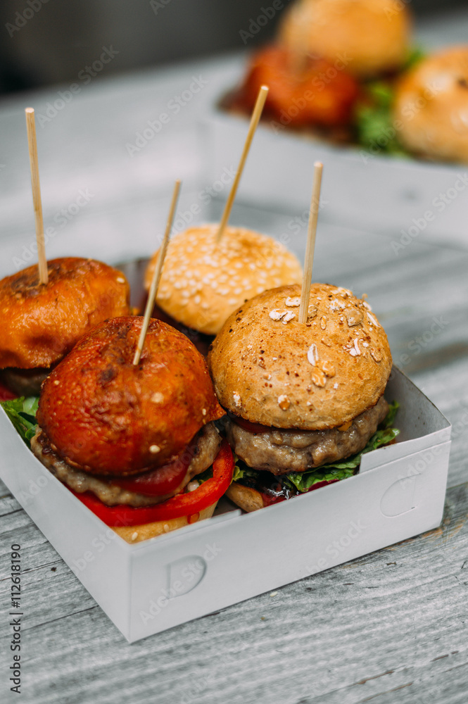 mini hamburgers, mini burgers, party food, finger food served Stock ...