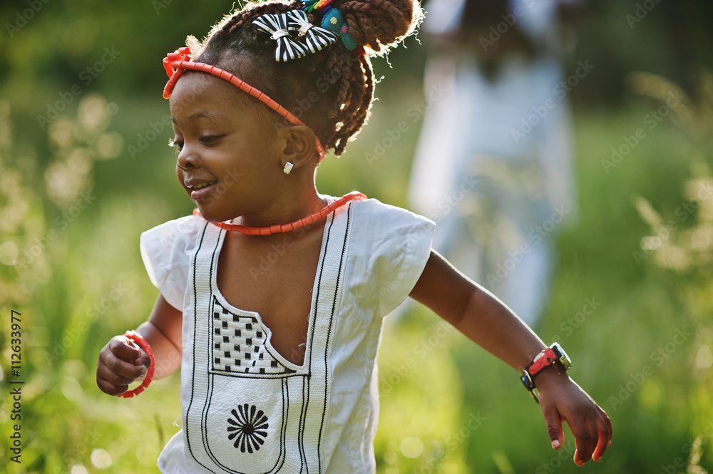 African baby girl walking at park Stock Photo | Adobe Stock