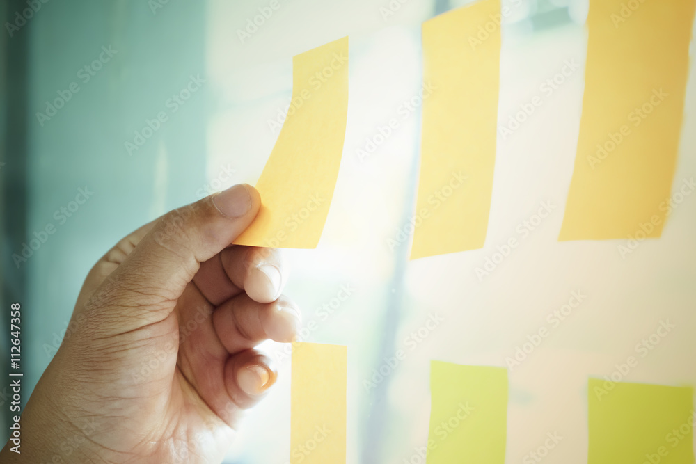 Note paper reminder schedule board. Business people meeting and use ...