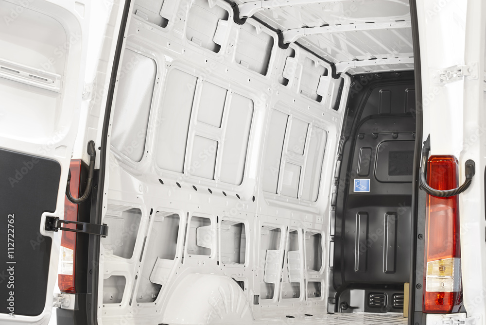 Empty van with open doors ready to be loaded Stock Photo | Adobe Stock