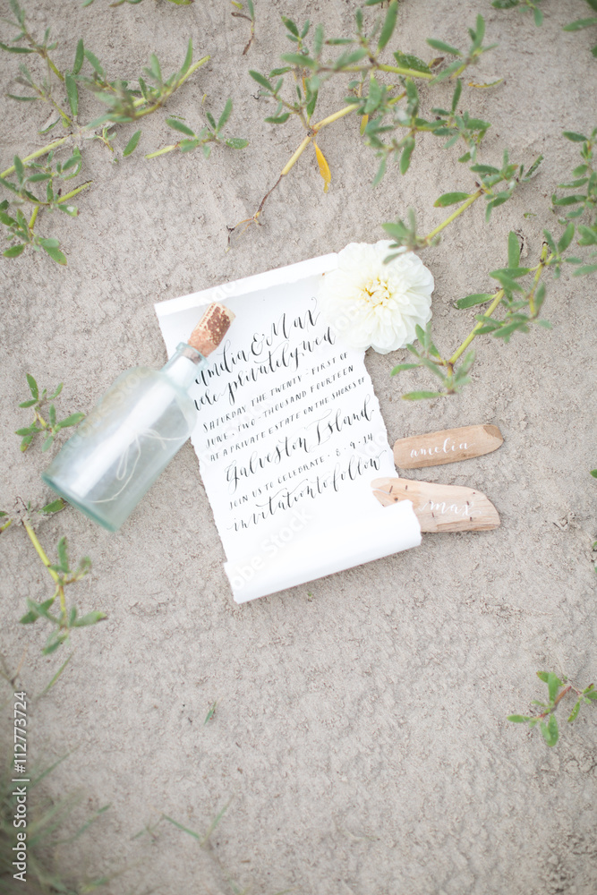 Wedding invitation themed as message in a bottle Stock Photo | Adobe Stock