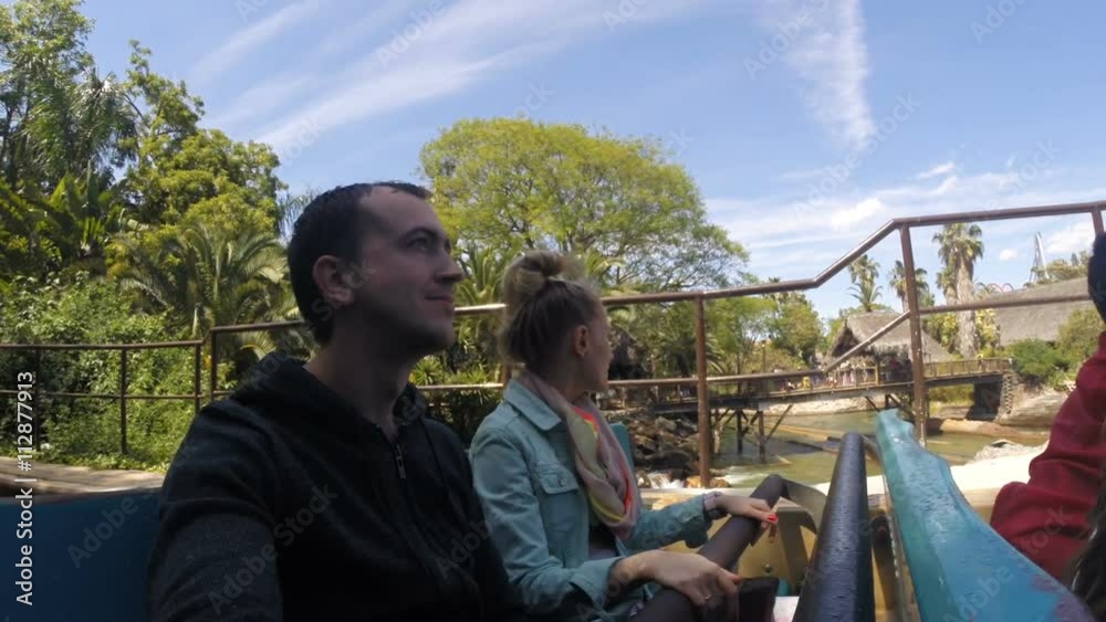Point of view - Fun wet roller coaster boat going down the hill into a ...