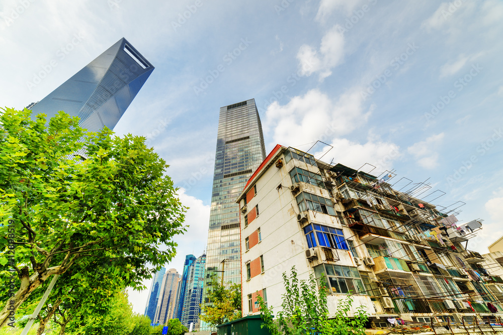 Old buildings coexist with modern skyscrapers in Shanghai, China Stock ...