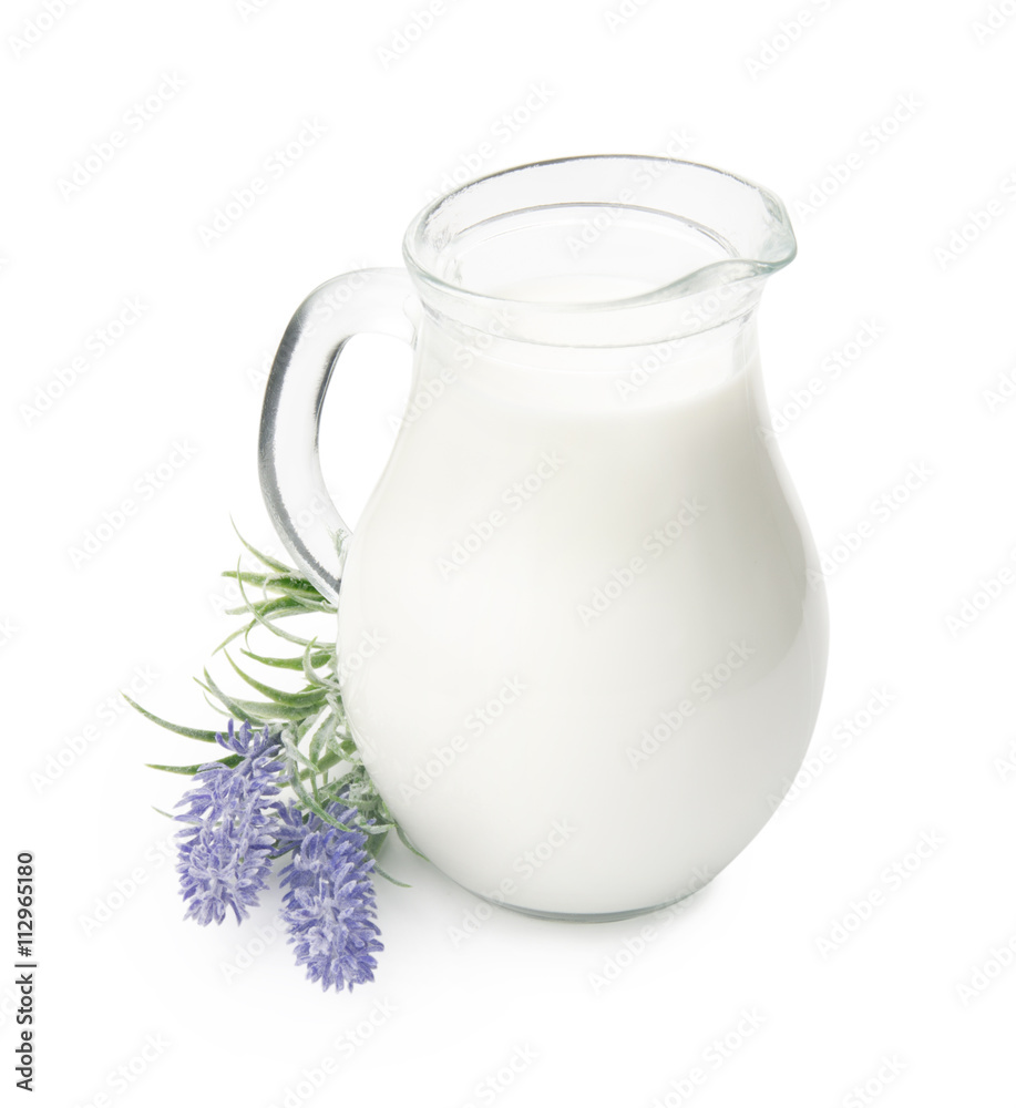 Pitcher of milk and flowers isolated on white background with clipping ...
