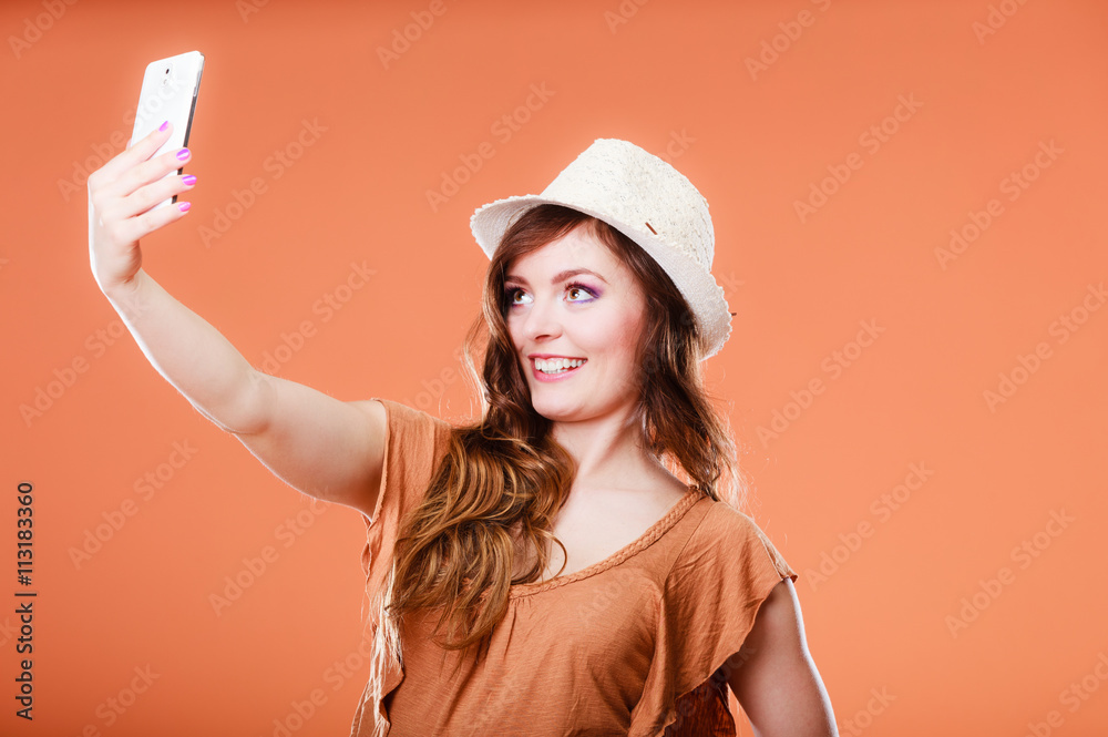 Woman taking self picture with smartphone camera Stock Photo | Adobe Stock