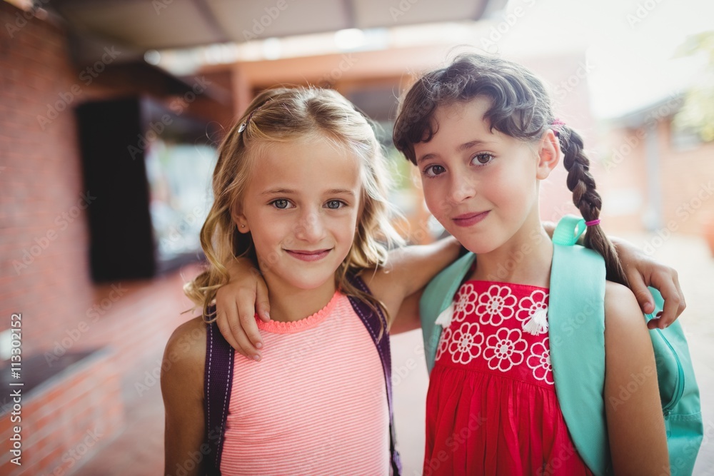 Two cute kids with arms around each other Stock Photo | Adobe Stock