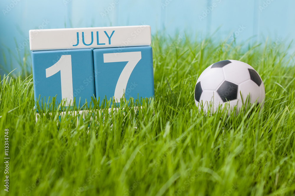 July 17th. Image of july 17 wooden color calendar on greengrass lawn ...