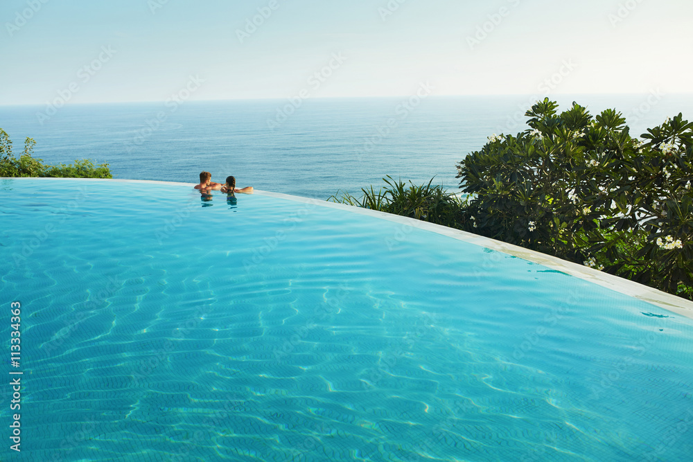 Romantic Vacation For Couple In Love. Happy People Relaxing In Infinity ...