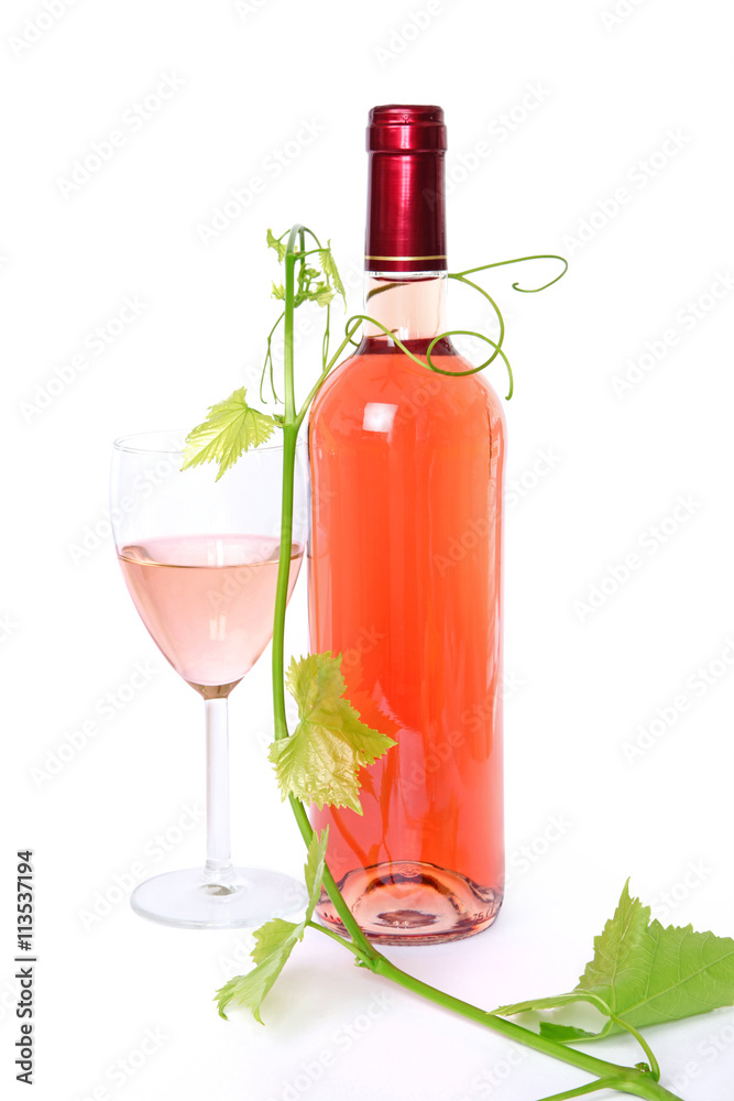 Bouteille et verre de vin rosé Photos | Adobe Stock