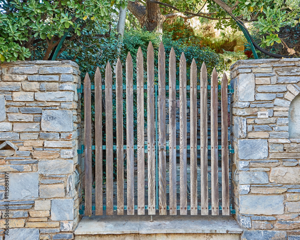 traditional house entrance, wooden door and stone wall Stock Photo ...
