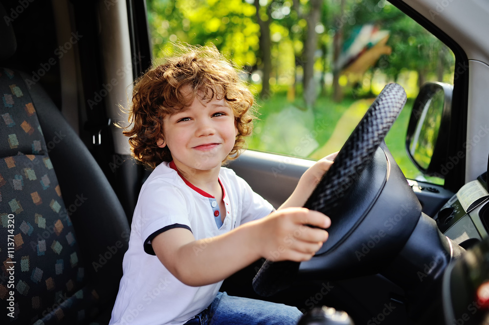 baby boy driving a car Stock Photo | Adobe Stock