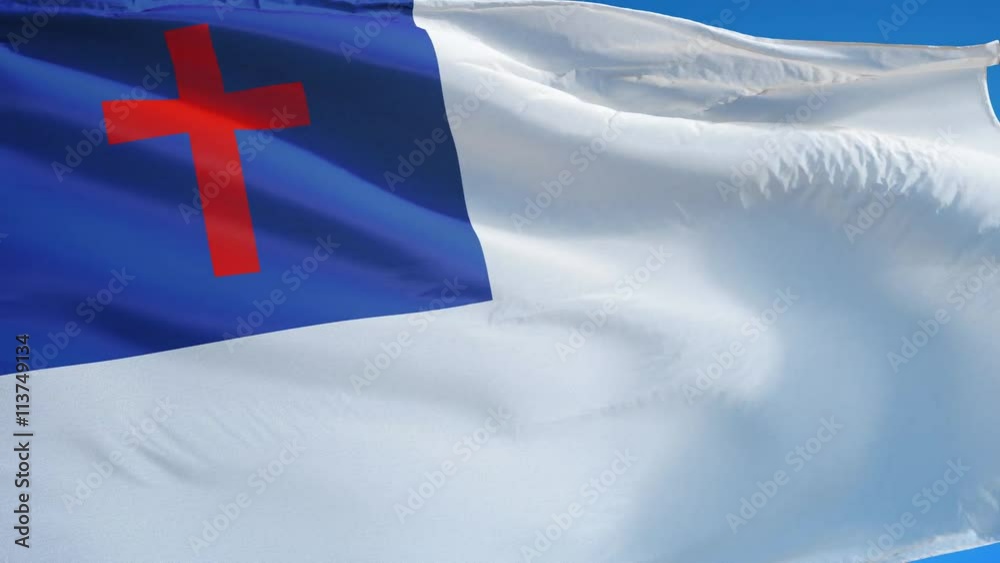Christian flag waving in slow motion against clean blue sky, seamlessly ...