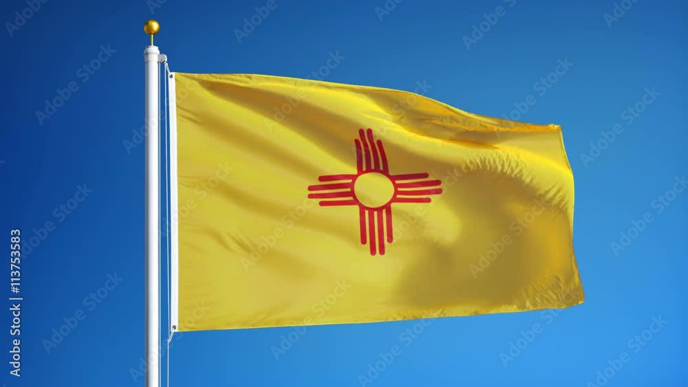 New Mexico flag waving in slow motion against clean blue sky ...