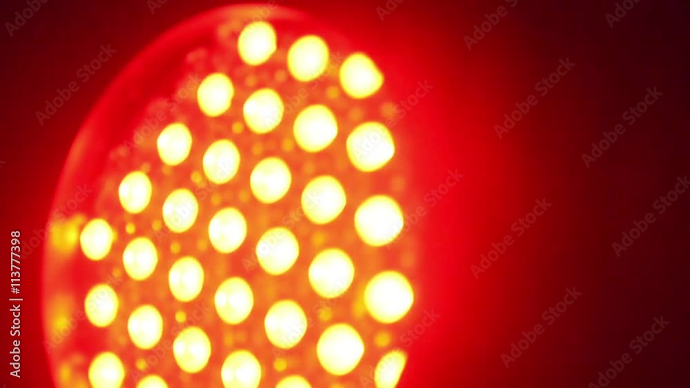 Rotating colorful red LED spotlight Stock Video | Adobe Stock