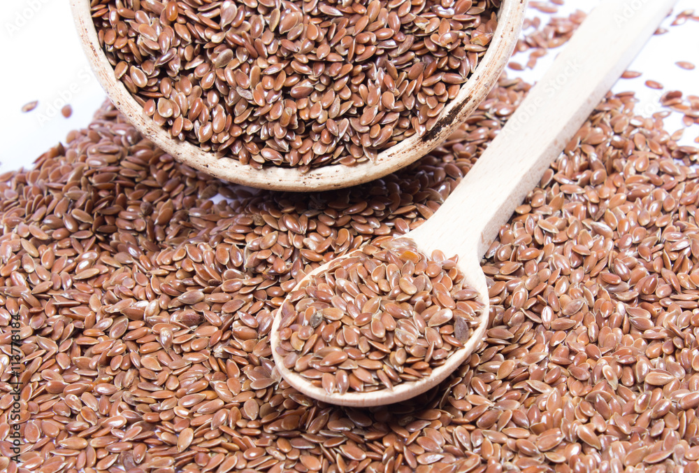 closeup of flaxseed isolated on white Stock Photo | Adobe Stock