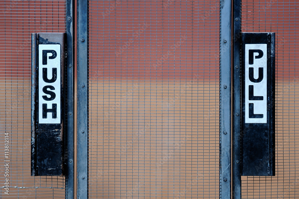 Push and pull gate signs Stock Photo | Adobe Stock