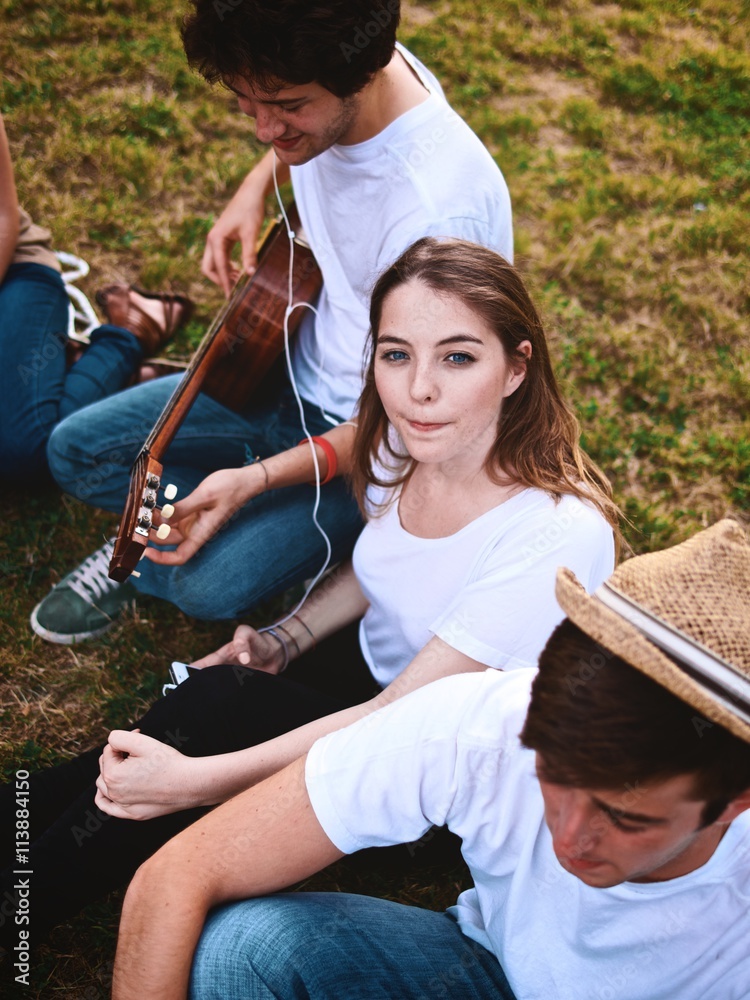 Fotografia do Stock: group of friends together in a park having fun and ...