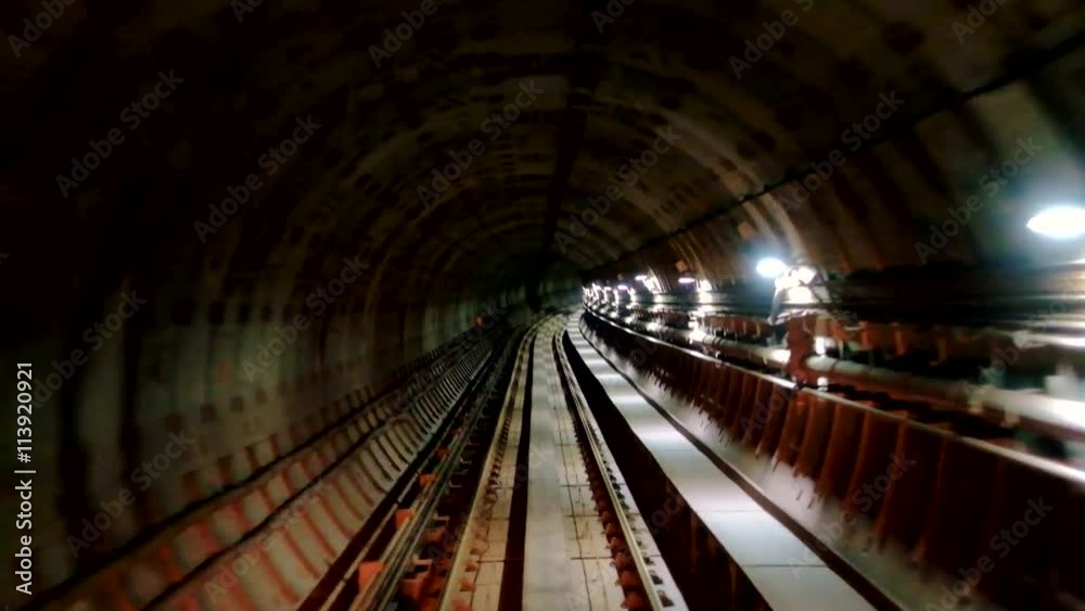 Movement through subway underground tunnel/View through the window of ...