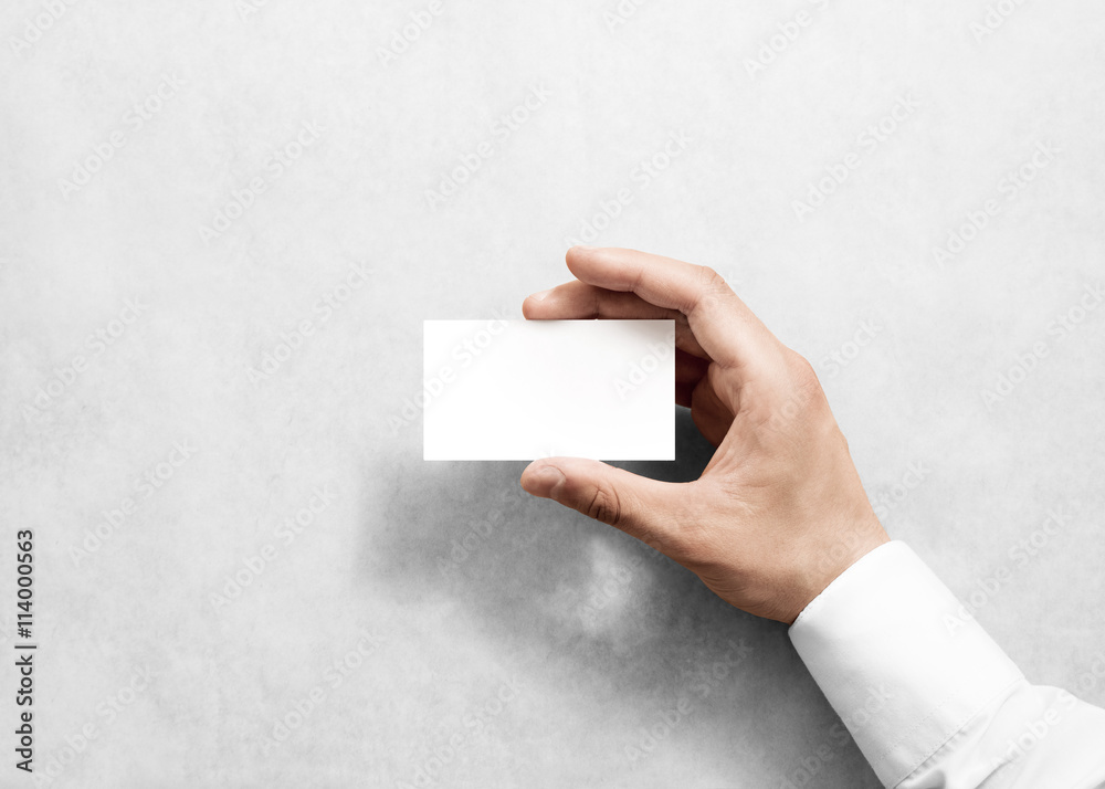 Hand holding blank white business card design mockup. Clear calling ...