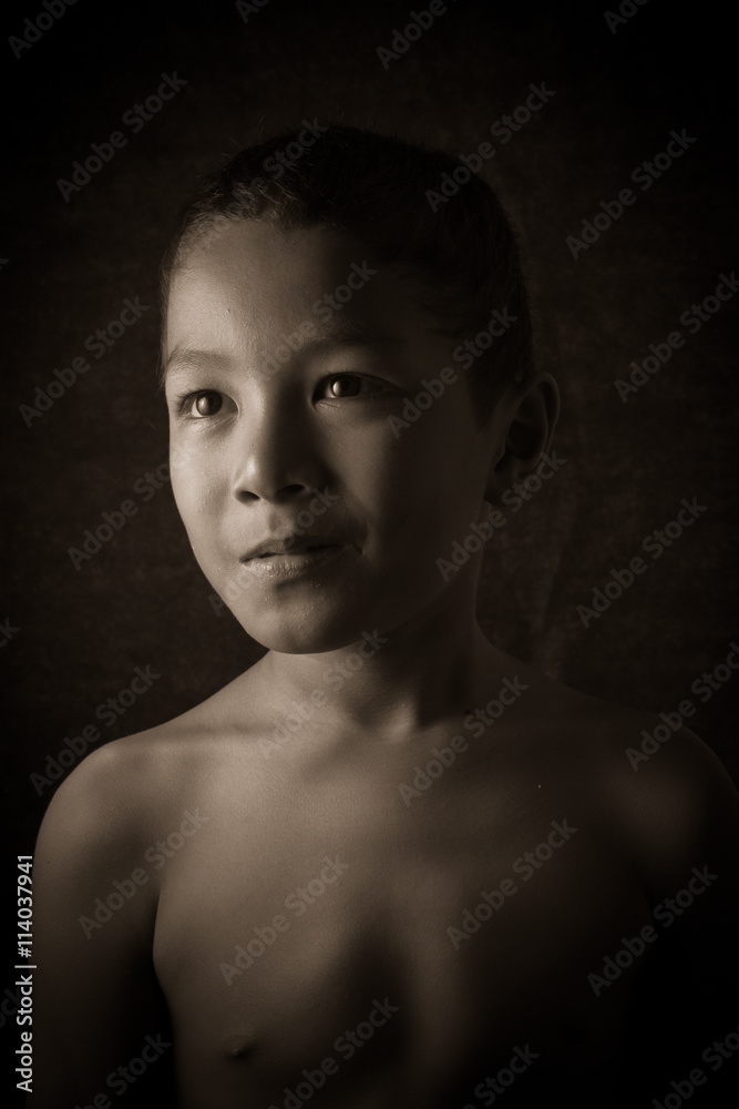 scared and alone, young Asian child who is at high risk of being ...