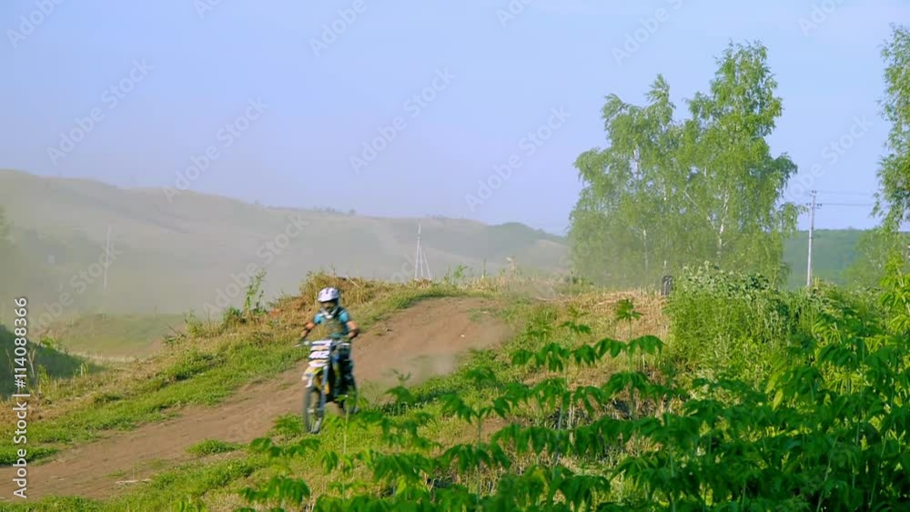 extreme sports motocross motorcycle jumping on a race on high speed ...