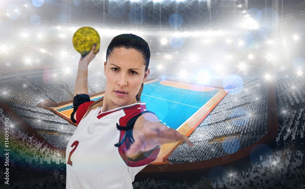 Composite image of sportswoman throwing a ball foto de Stock | Adobe Stock