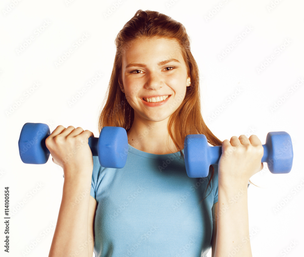young pretty slim woman with dumbbell isolated cheerful smiling, real ...