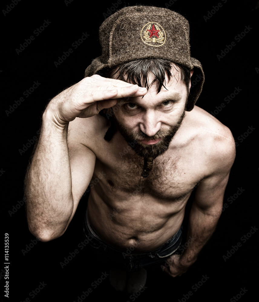 Dark portrait of scary evil sinister bearded man with smirk, makes ...