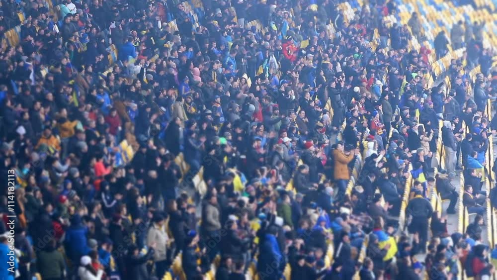 Happy fans applauding footballers at field and leaving stadium, game ...