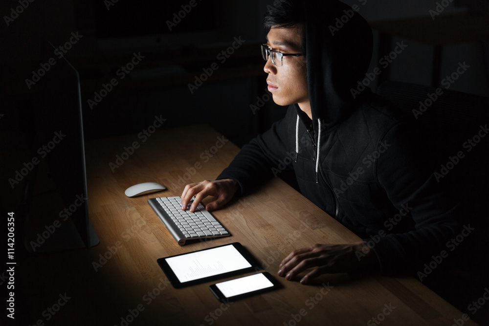 Hacker stealing information using blank screen tablet and smartphone ...