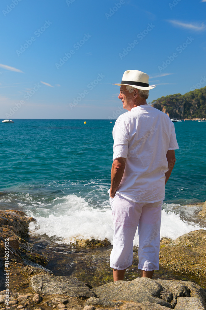 Man at the beach Stock Photo | Adobe Stock