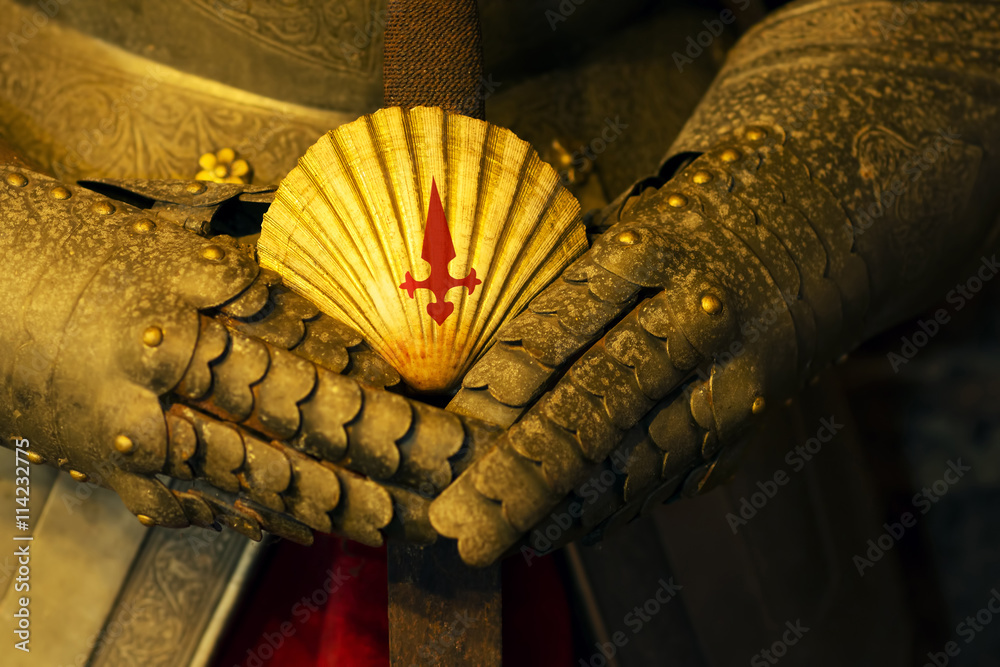 scallop pilgrim sign on the sword hilt in medieval armour ; way of st ...