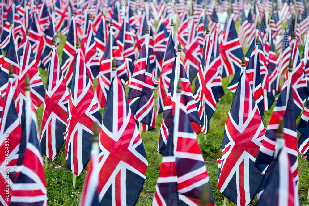 British United Kingdom UK Flags in a row with front focus and the ...