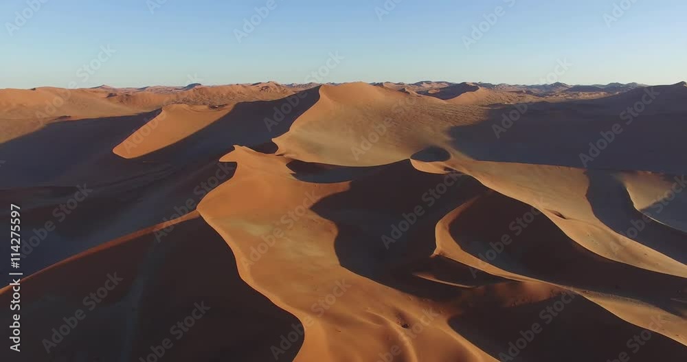 Vidéo Stock 4K aerial view of endless sand dunes of the Namib desert ...