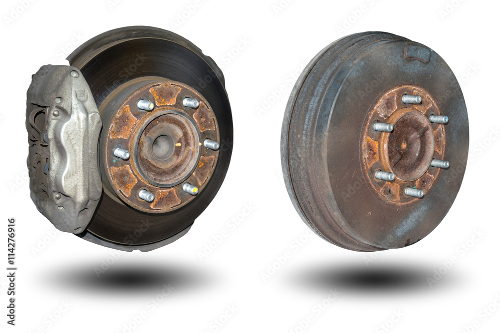 Old rusty disc brakes front wheel and back drum brakes of the car ...