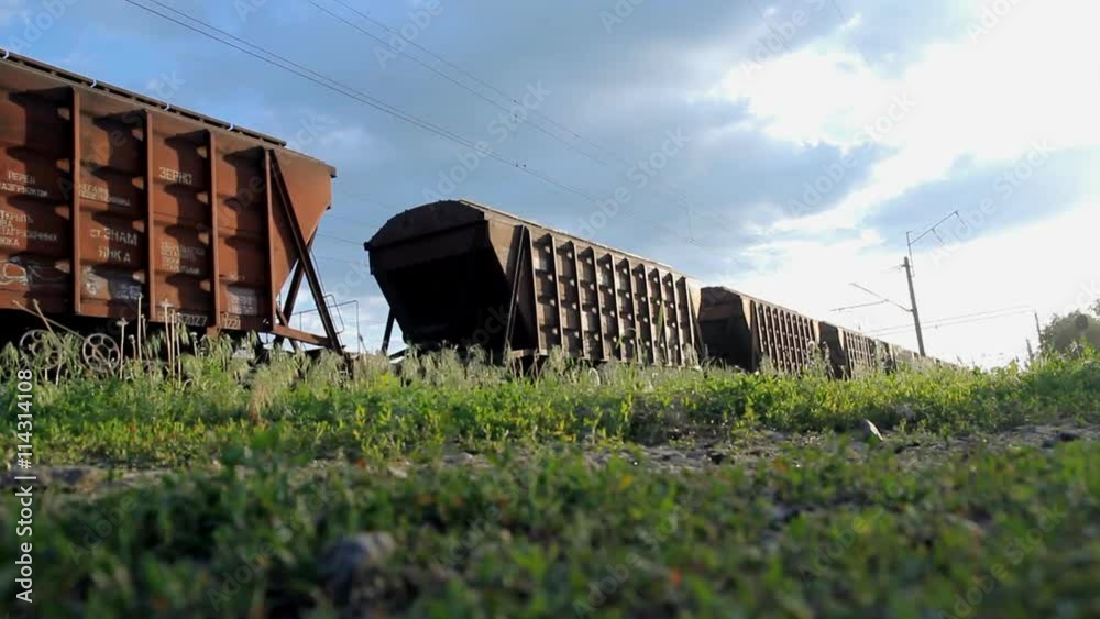 Cargo Train Pulls Cargo train with wagons, a Train pulls the railroad ...