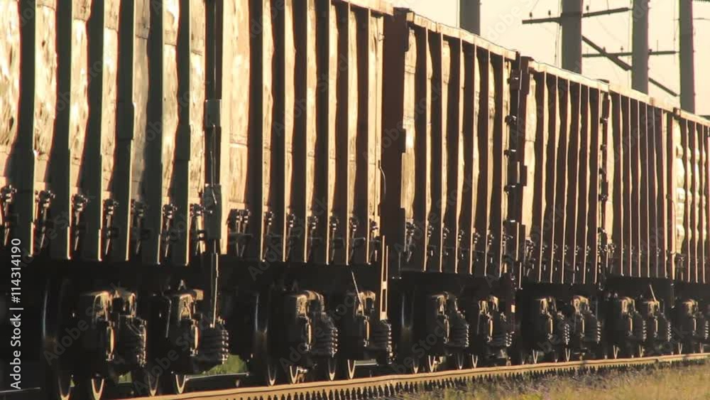 Cargo Train Pulls Cargo train with wagons, a Train pulls the railroad ...