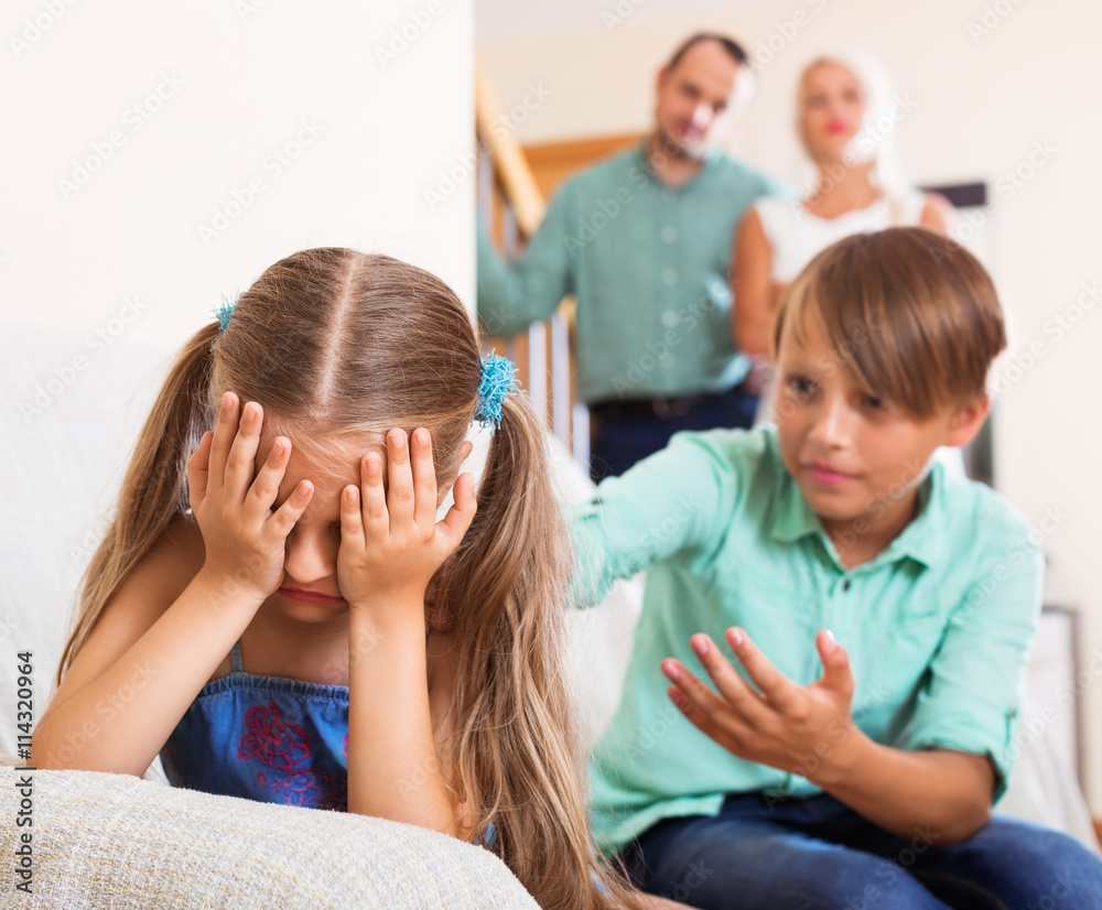 Brother sister calms crying at home Stock Photo | Adobe Stock